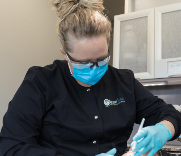 Tooth Extractions - Simple & Surgical Extractions - Uptown Dental